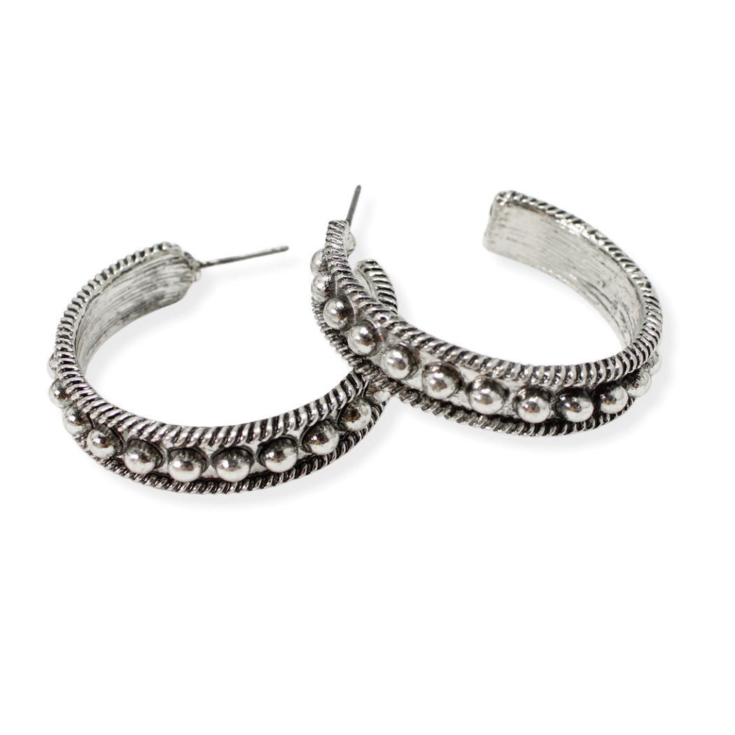 106997, WESTERN BALL TEXTURED ROUND HOOP EARRING – GOOD FEELINGS, INC